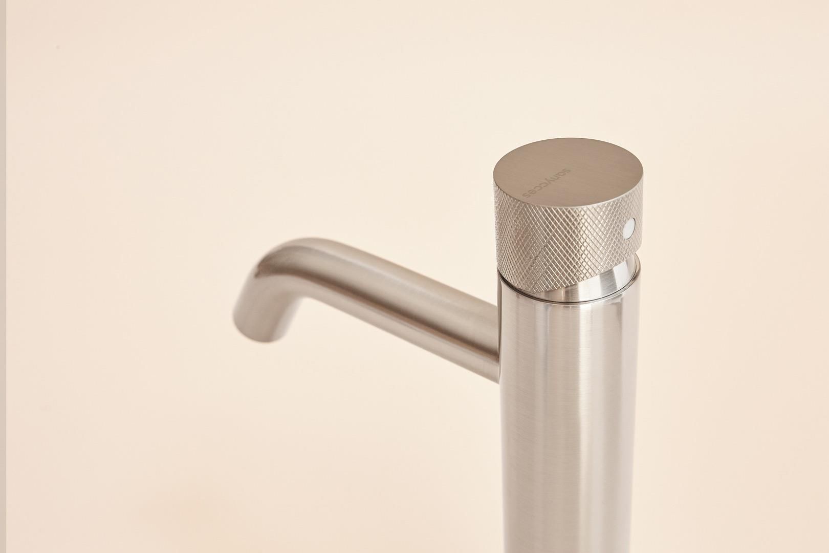 Monomando de lavabo, referencia MNO011 de la serie Loop K de Sanycces. Sistema de apertura en ...